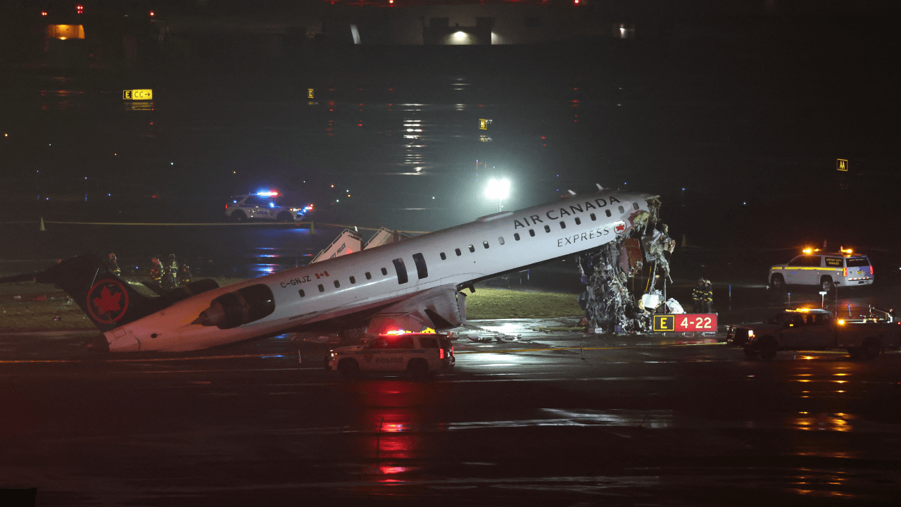 Plane, fire truck collide on runway at New York's LaGuardia Airport