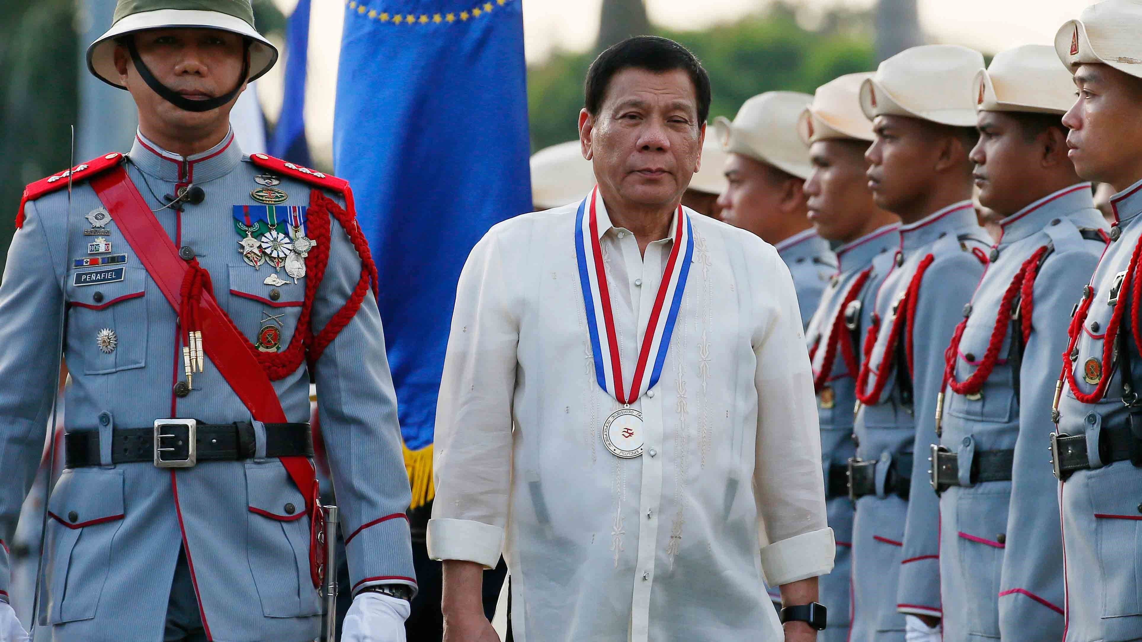 Duterte says he is 'responsible' as ICC takes him into custody