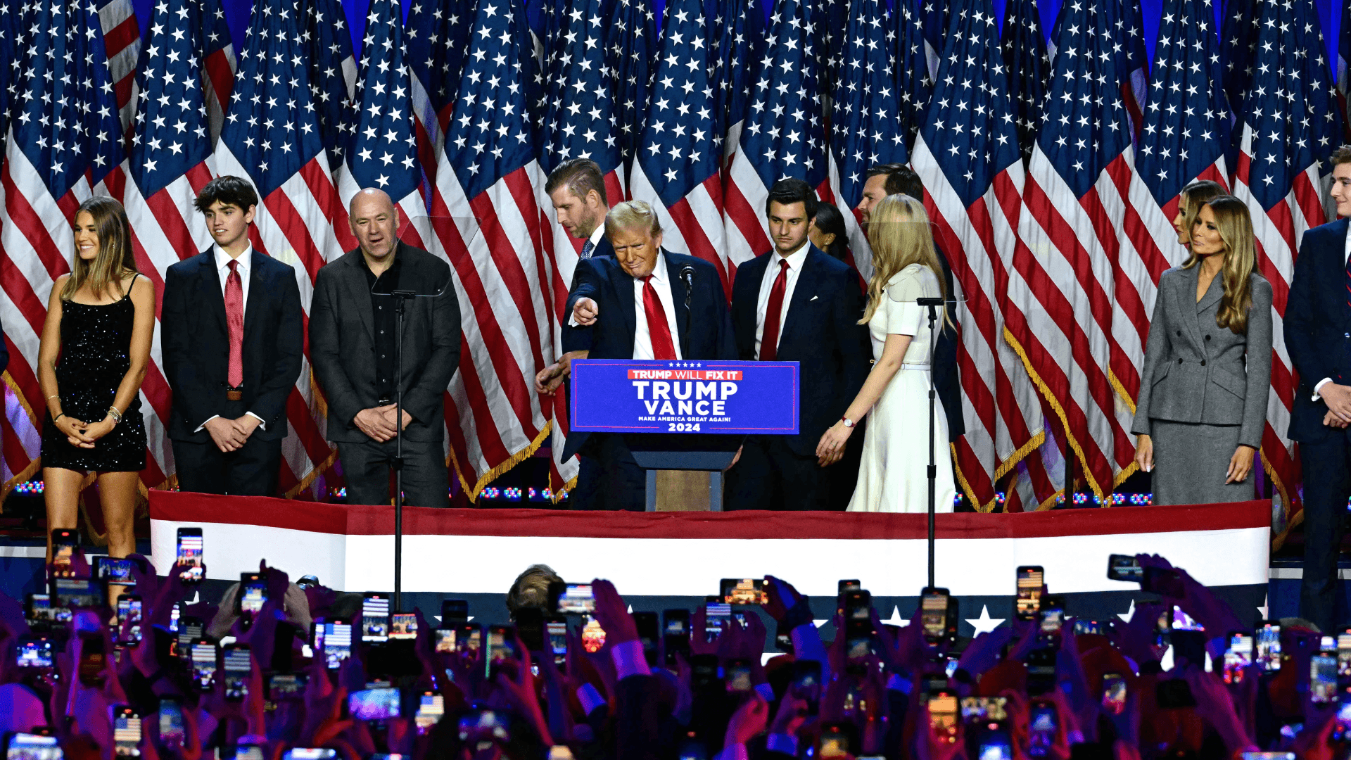 Donald Trump address supporters on stage in Florida